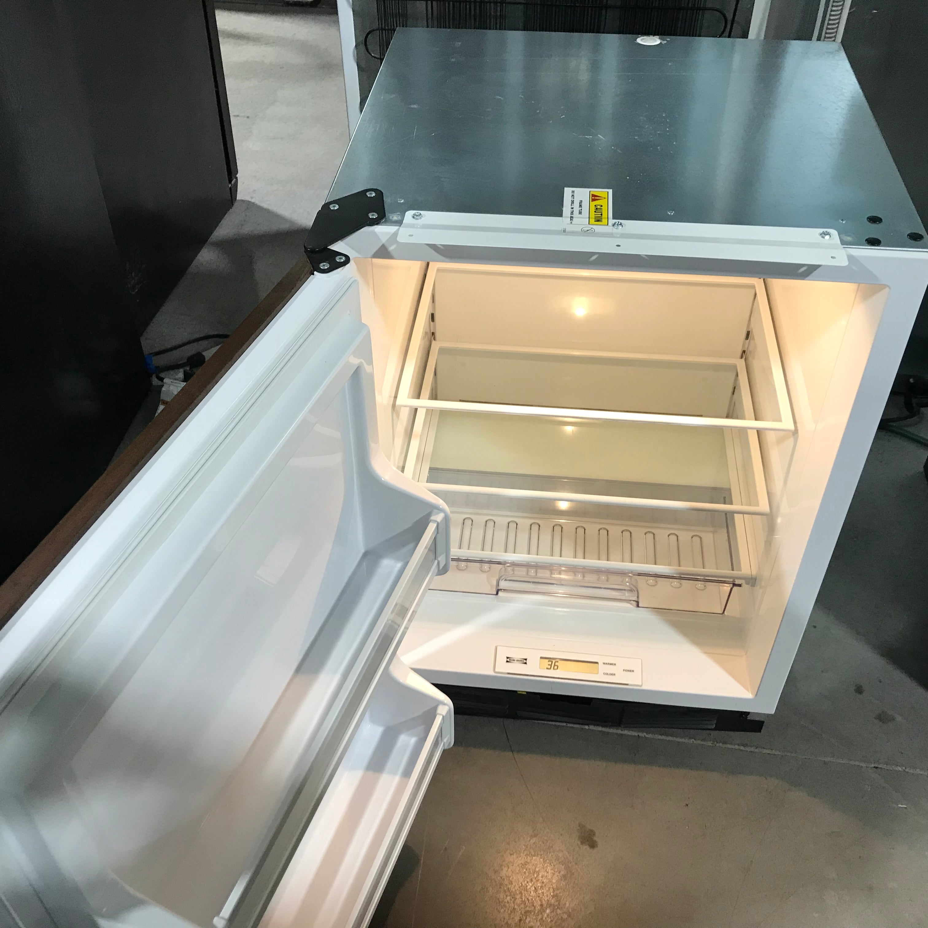 Sub-Zero Wood Paneled Under-The-Counter Refrigerator 24"x 24"x 35 ...